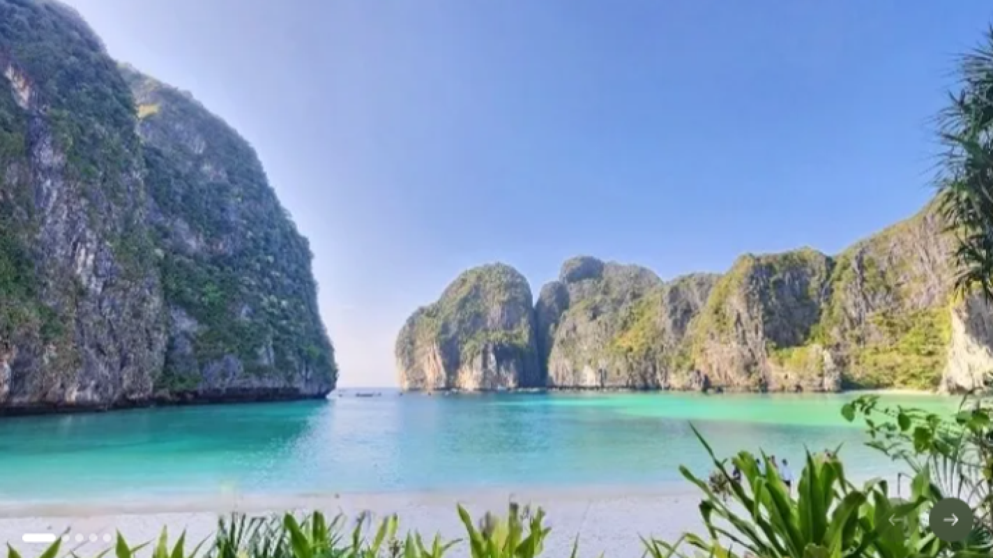 Give A Hand | A traveler carrying a bag and stories